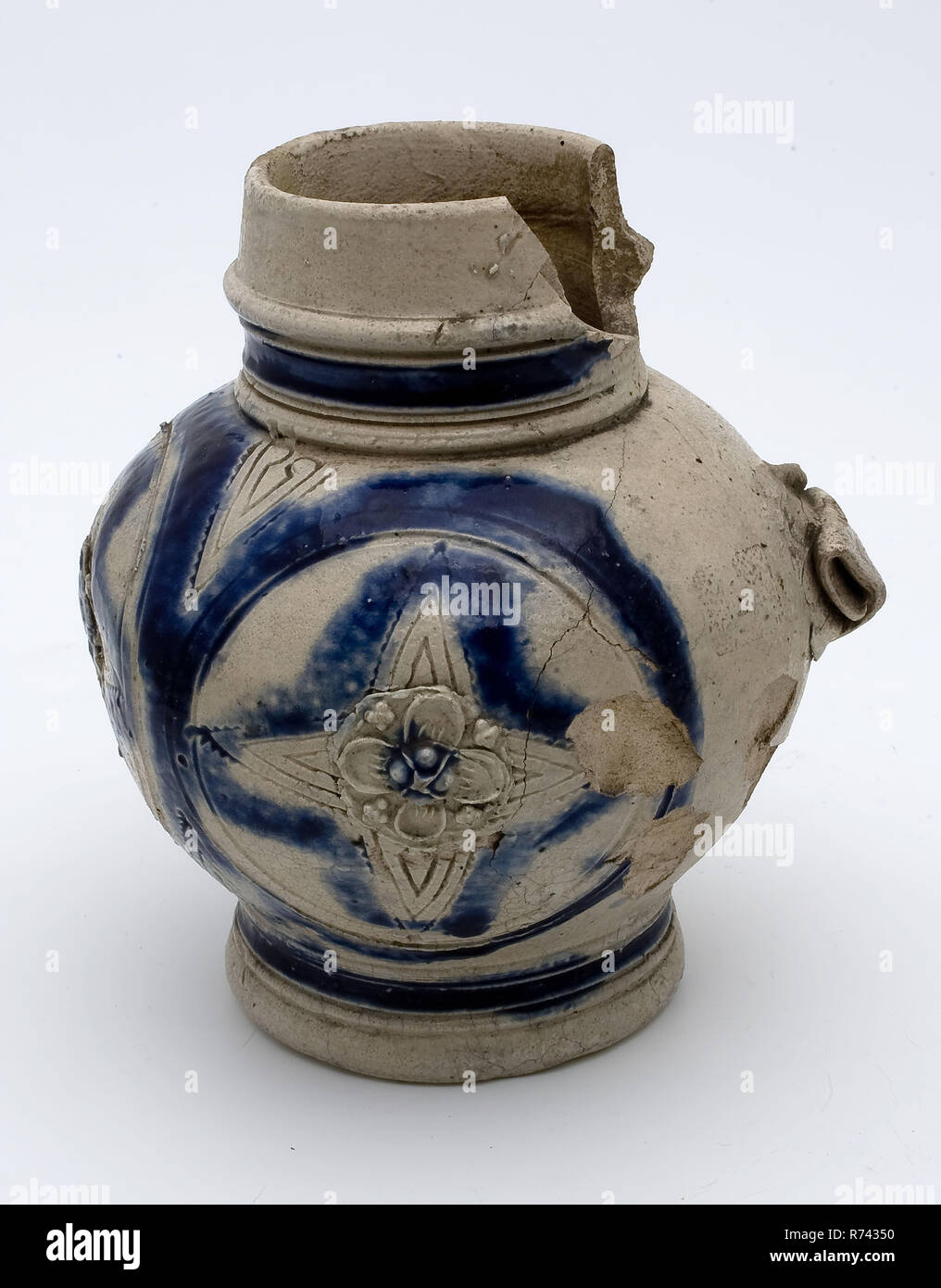 Small stoneware bell-jug with three circles on the belly in which ...