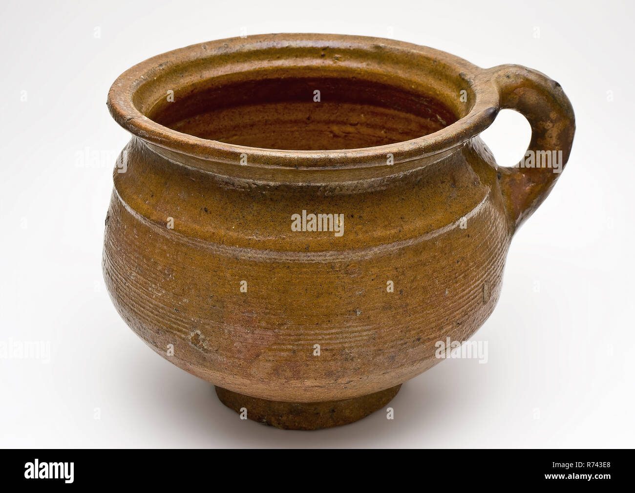 Pottery chamber pot, belly model with wide neck opening and band ear ...