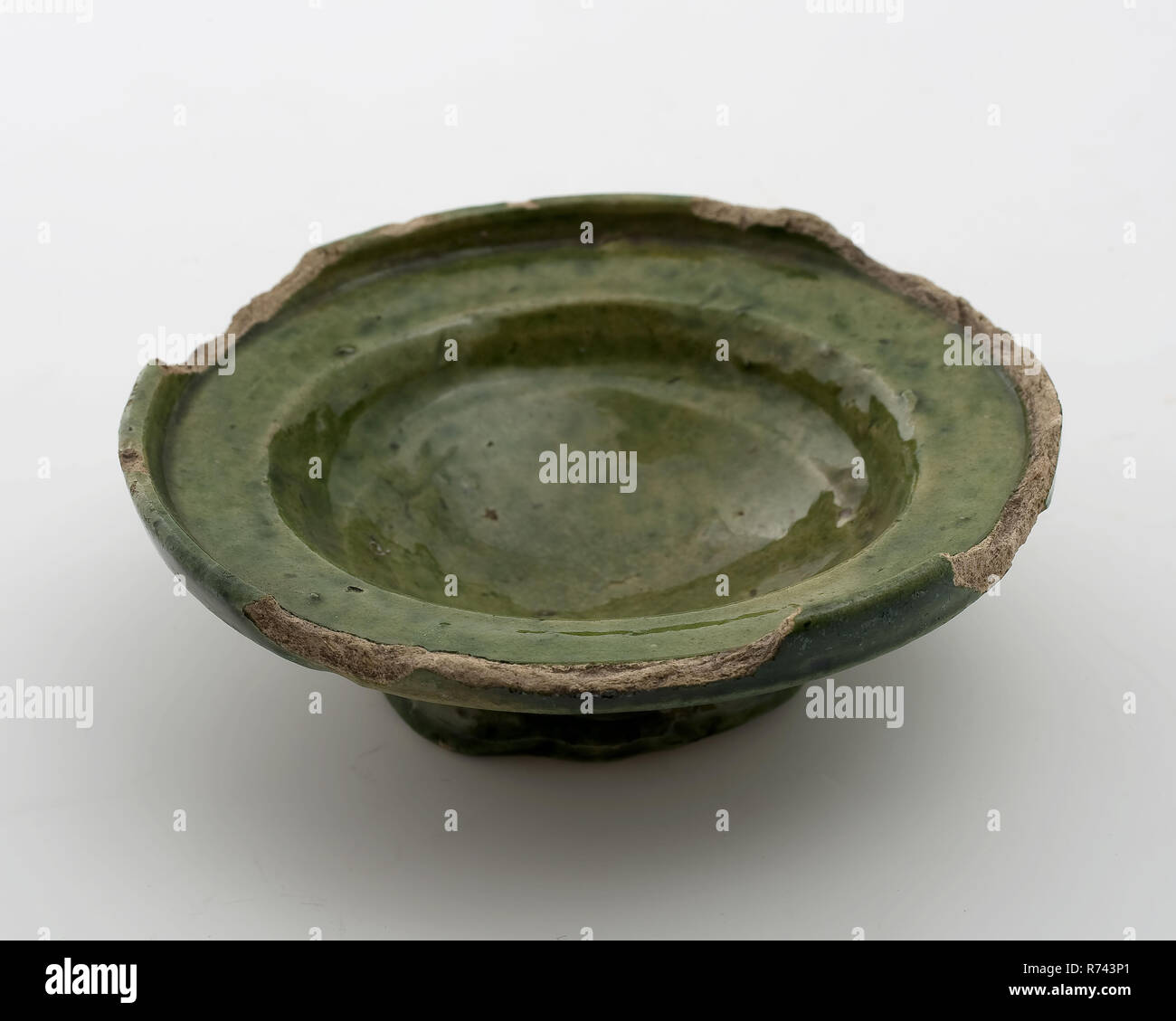 Small earthenware bowl, white shard, green lead glaze, stand ring ...