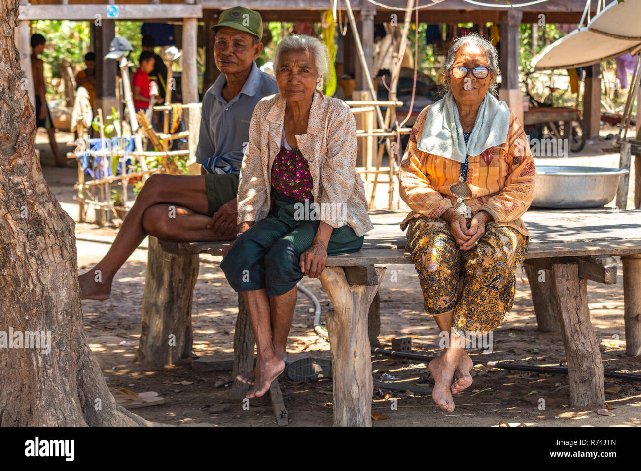 Elderly man sitting barefoot on hi-res stock photography and images - Alamy
