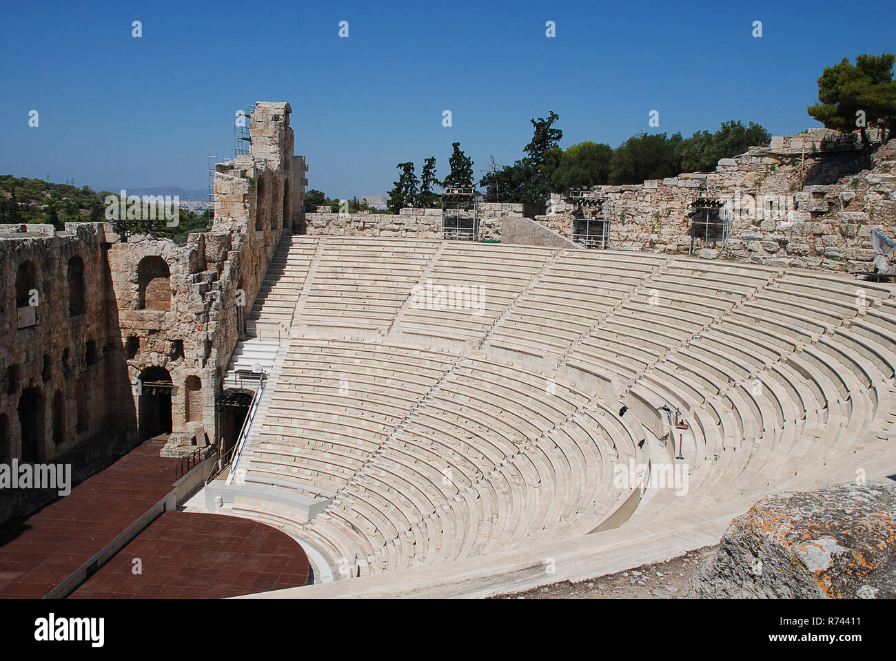 The Odeon of Herodes Atticus is a stone theatre structure located on the southwest slope of the ...