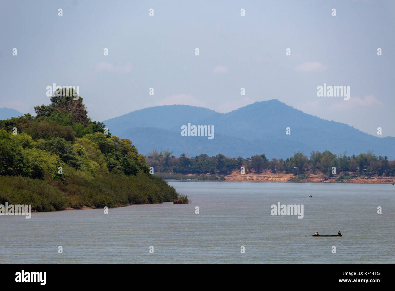 Don Daeng, Laos - April 27, 2018: Fishing boat navigating the Mekong ...