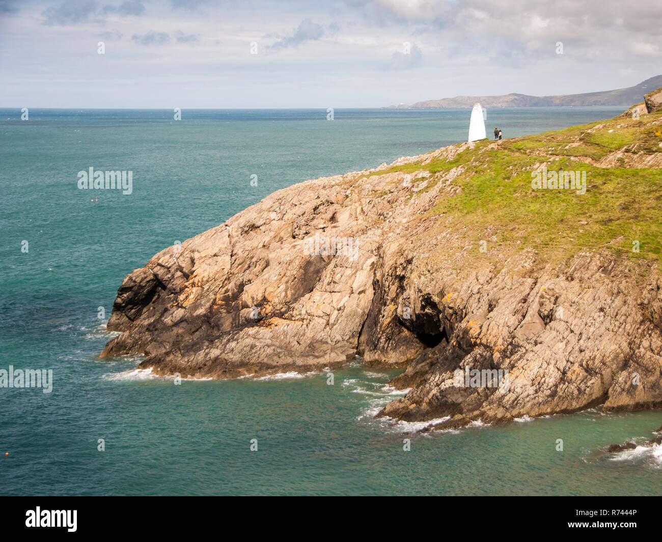 A cairn marks the entrance to Porthgain Harbour on the Pembrokeshire ...