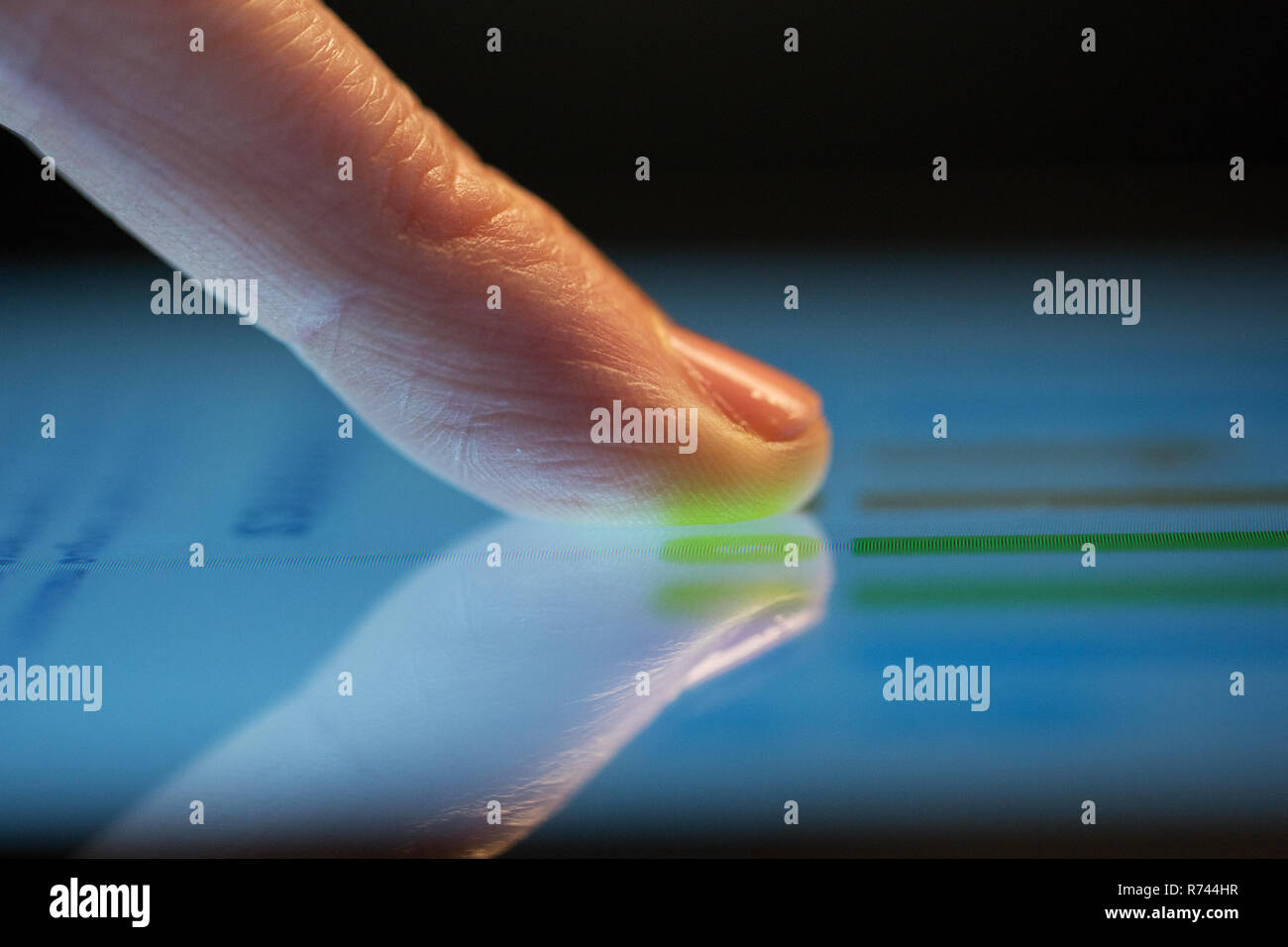 close up of hand using computer touch screen Stock Photo - Alamy