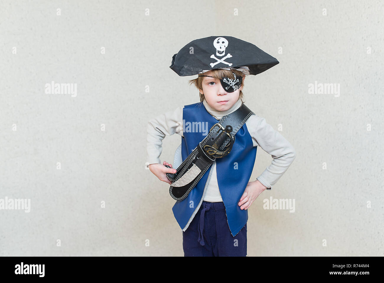 child boy playing pirate. Pirate costume on a child. The captain of a ...