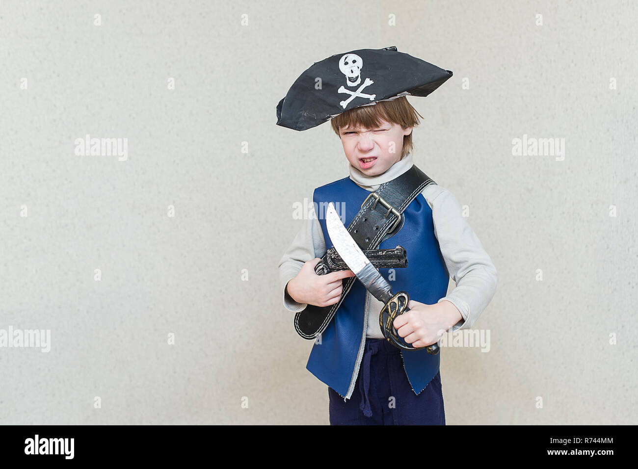 child boy playing pirate. Pirate costume on a child. The captain of a ...