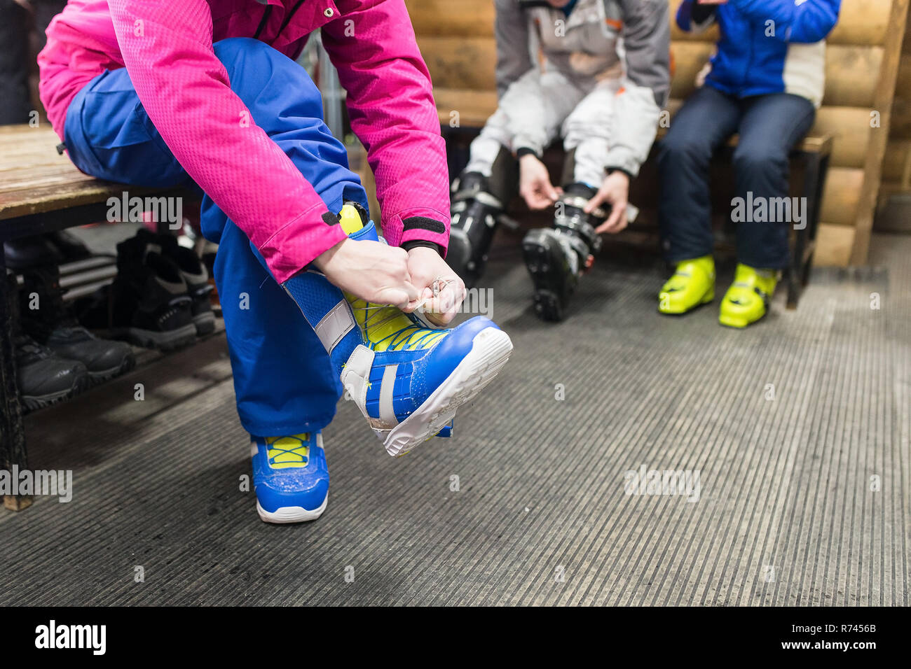 Girl putting on boot hi-res stock photography and images - Alamy