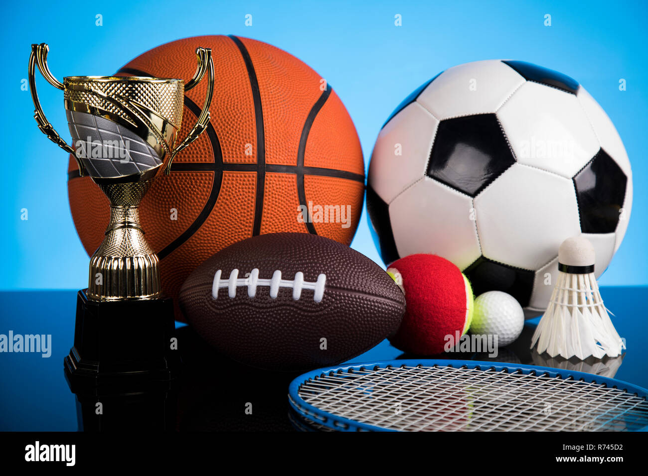 Winner trophy, Sport equipment and balls Stock Photo - Alamy