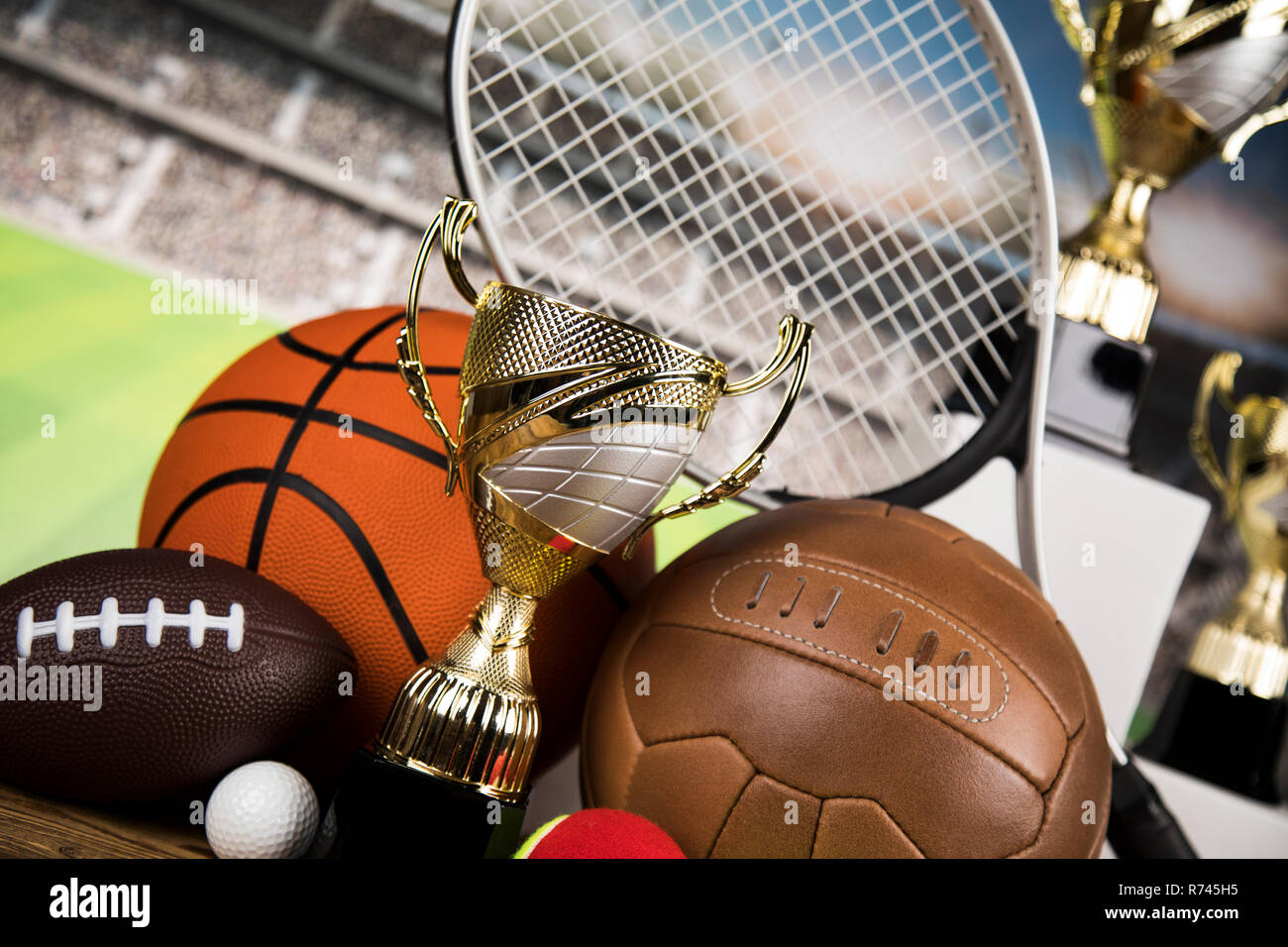 Winner trophy, Sport equipment and balls Stock Photo - Alamy