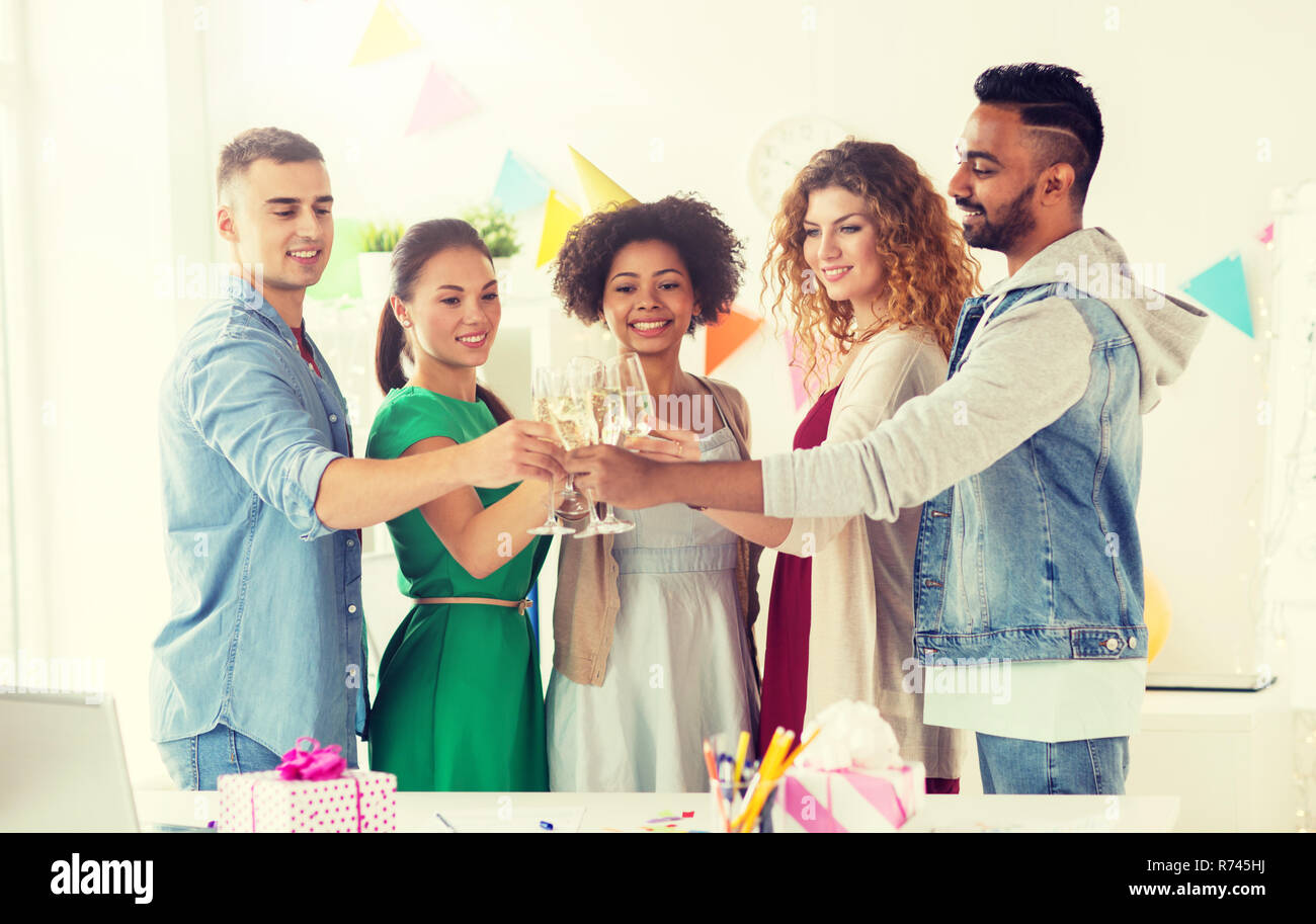 happy team with champagne at office birthday party Stock Photo - Alamy