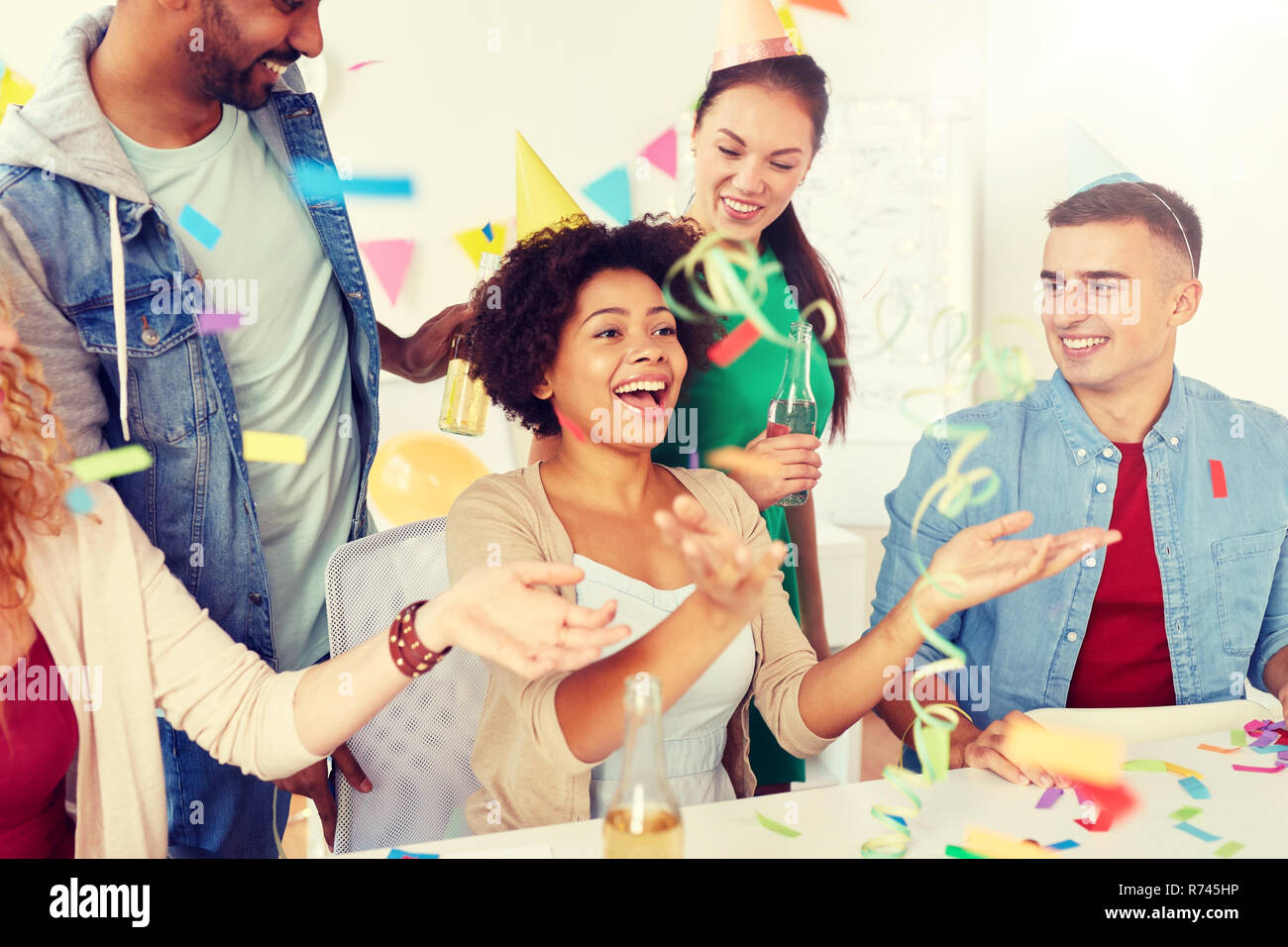 happy team having fun at office party Stock Photo - Alamy