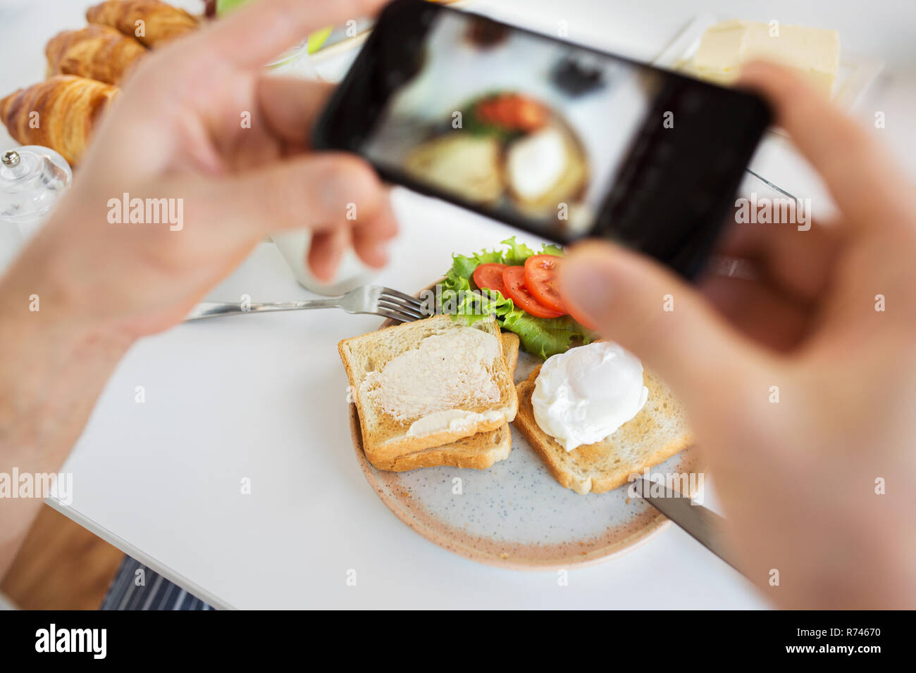 hands with smartphones photographing food Stock Photo - Alamy
