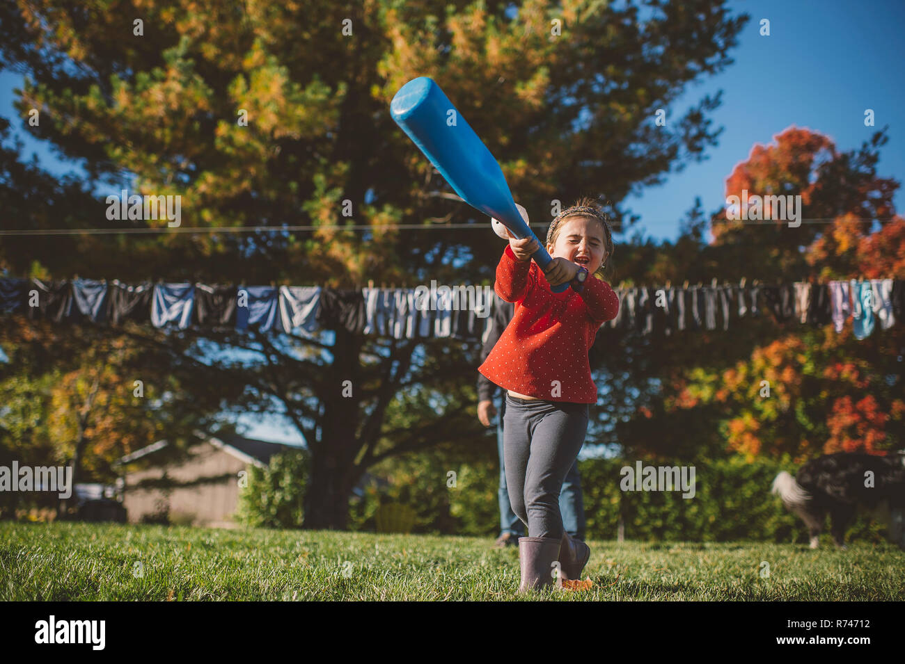 Girl baseball bat hi-res stock photography and images - Alamy
