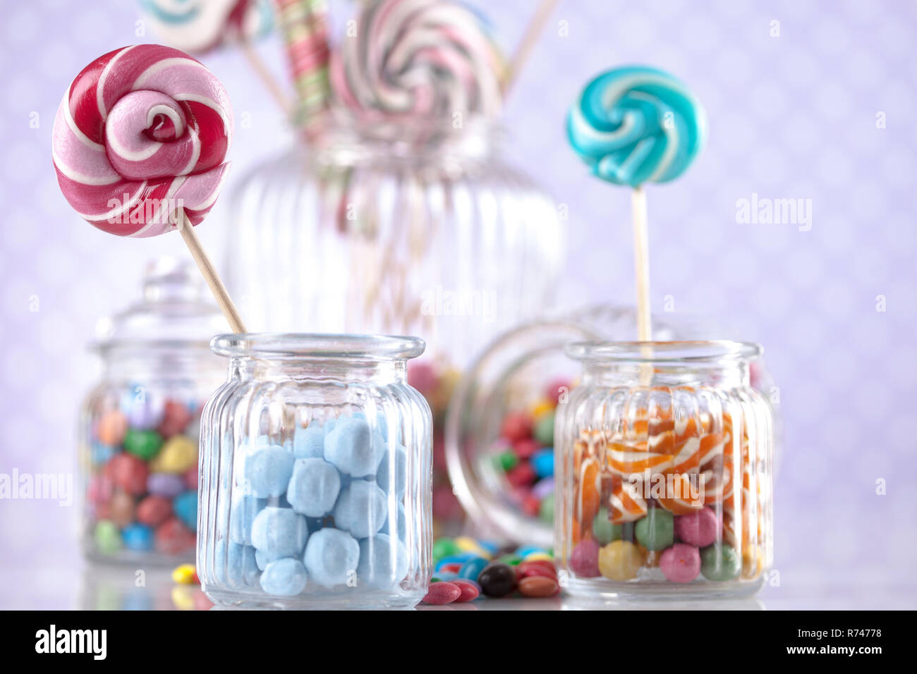 Colorful gum sweet candy and lollipops and gum balls Stock Photo - Alamy