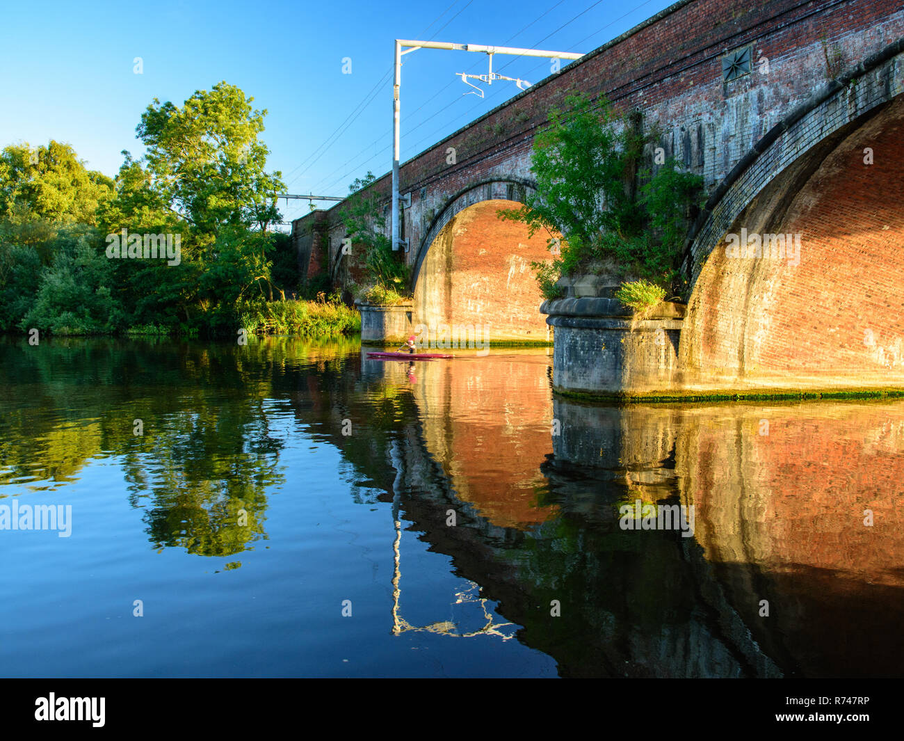Reading, England, UK - August 29, 2016: A solitary rower paddles a ...