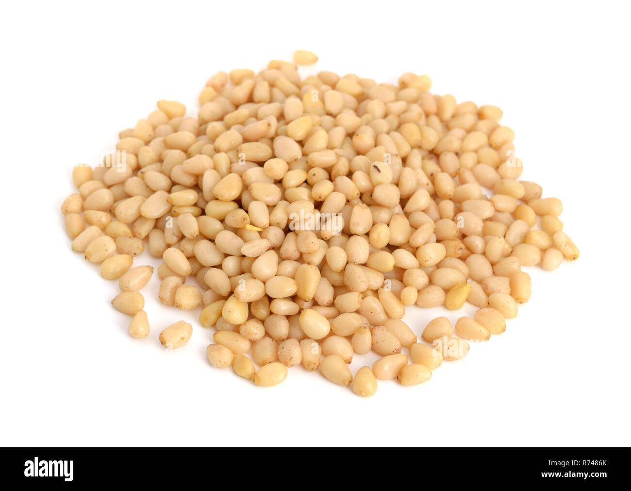 Shelled pine nuts. Isolated on white background Stock Photo - Alamy