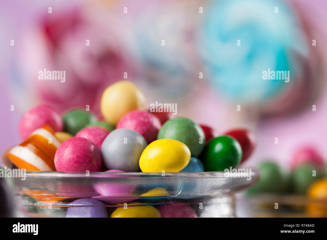 Colorful gum sweet candy and lollipops and gum balls Stock Photo - Alamy