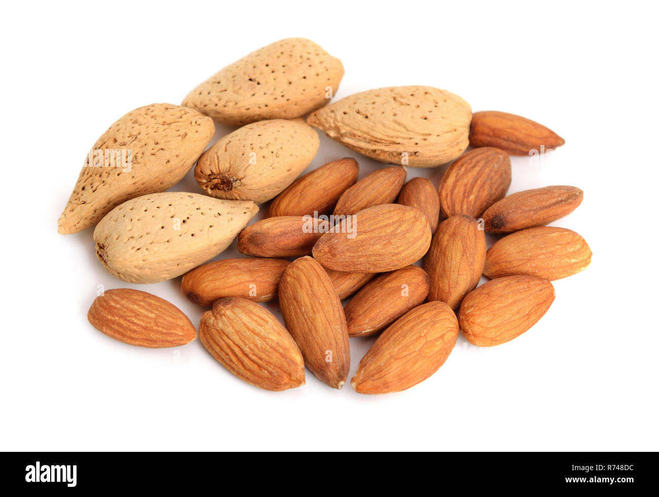Almond in shell and shelled isolated on white Stock Photo - Alamy
