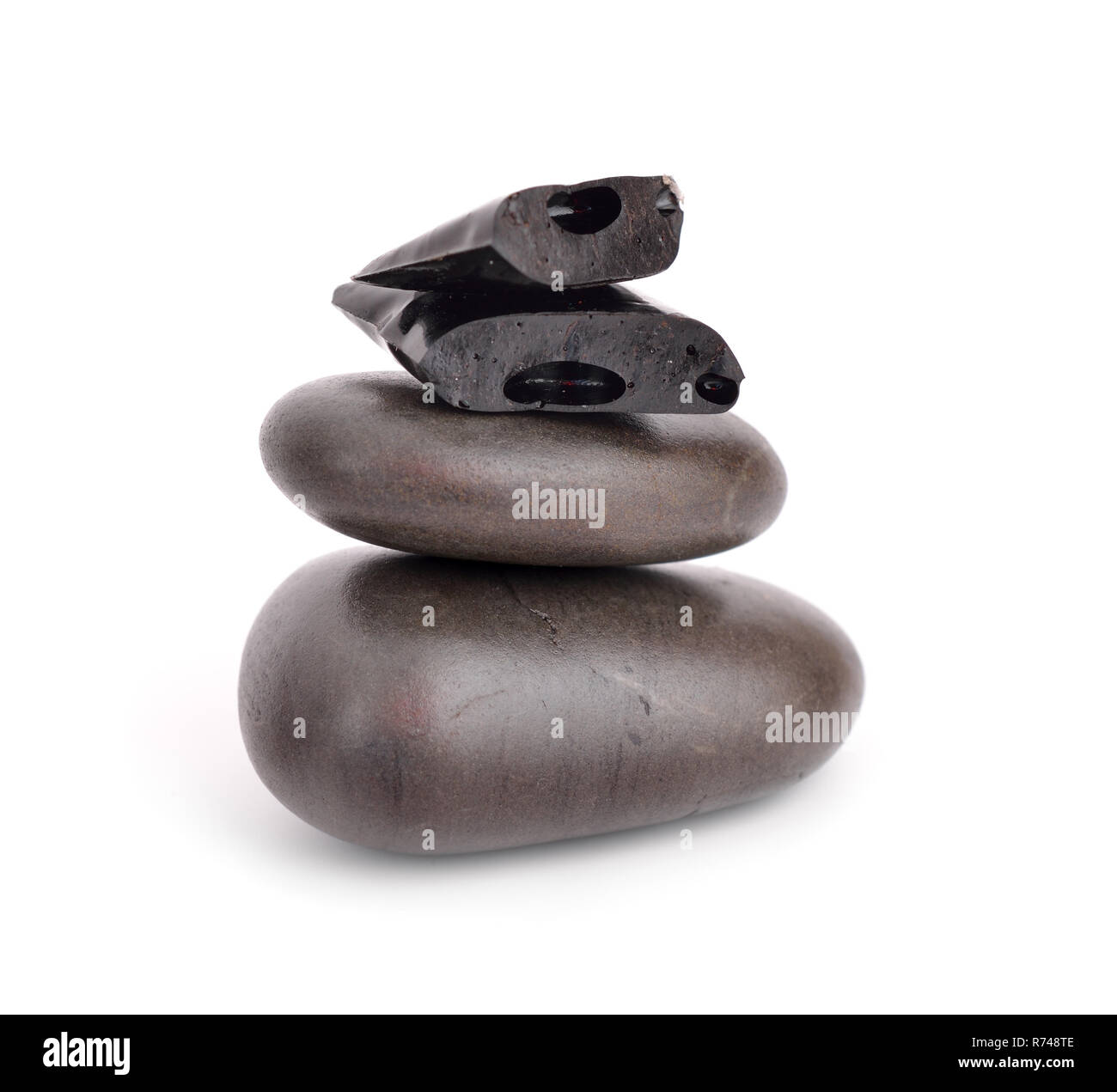 Shilajit, Mumijo with stones isolated on white background Stock Photo ...