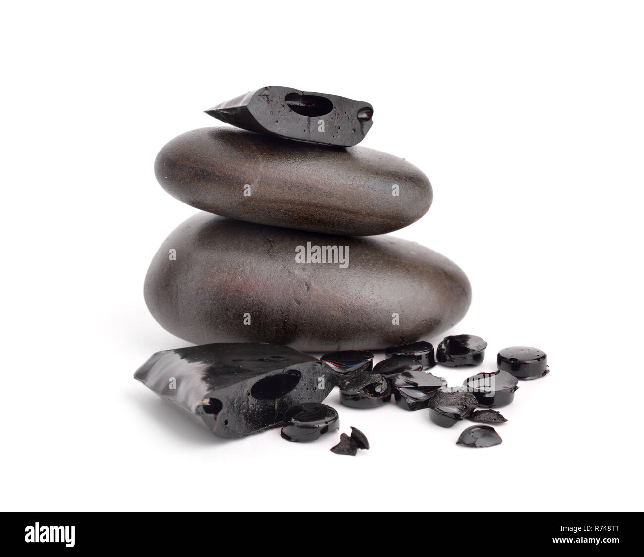 Shilajit, Mumijo with stones isolated on white background Stock Photo ...
