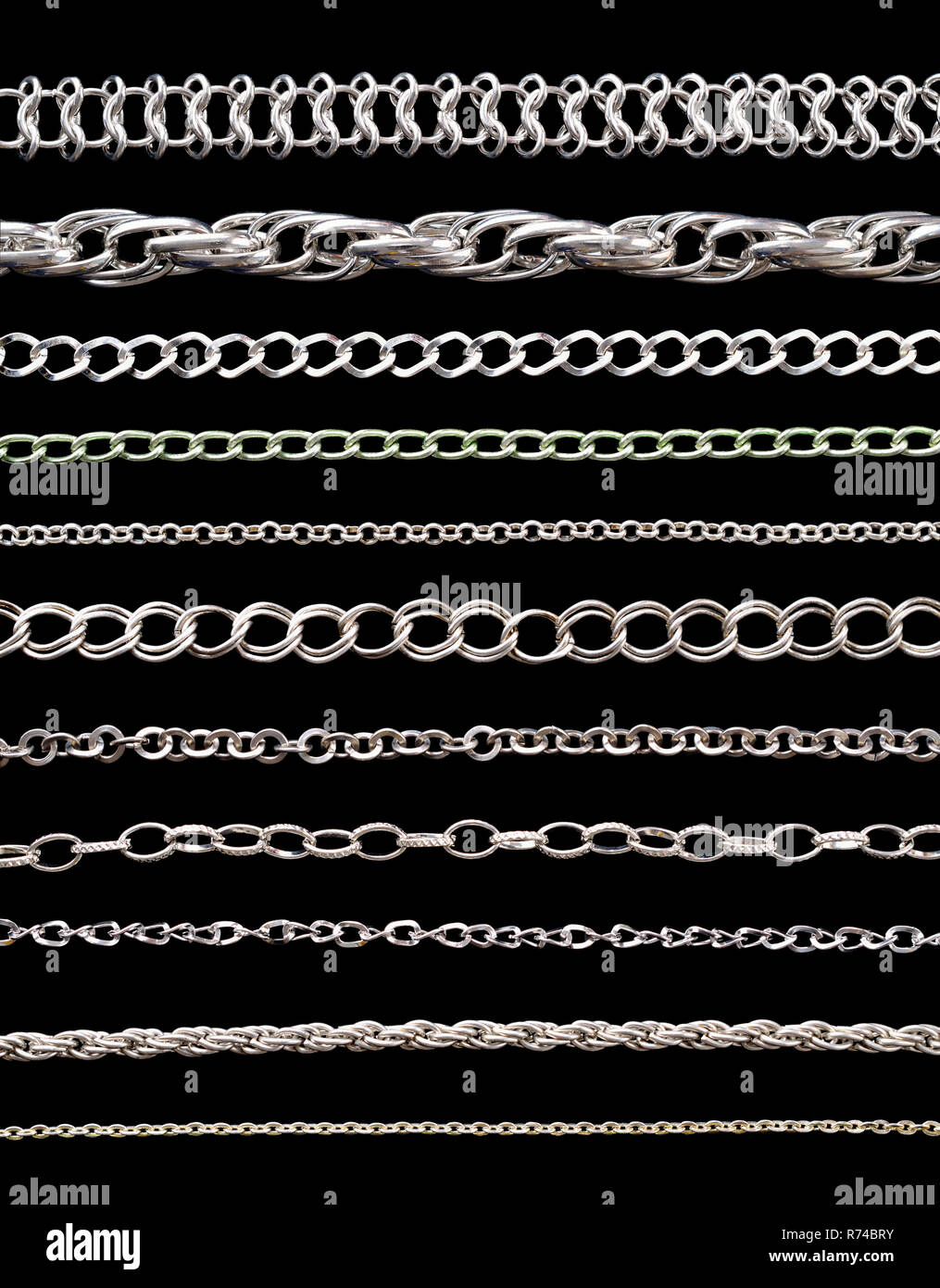 Collection of chains on a black background Stock Photo - Alamy