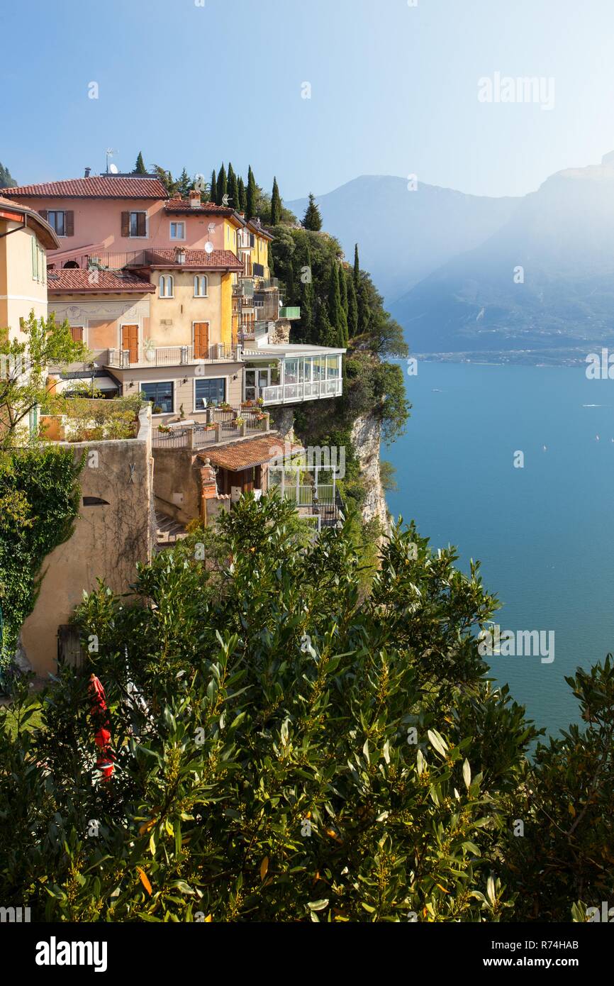 view of the famous terrace in a small town Tremosine at dawn. Italy ...