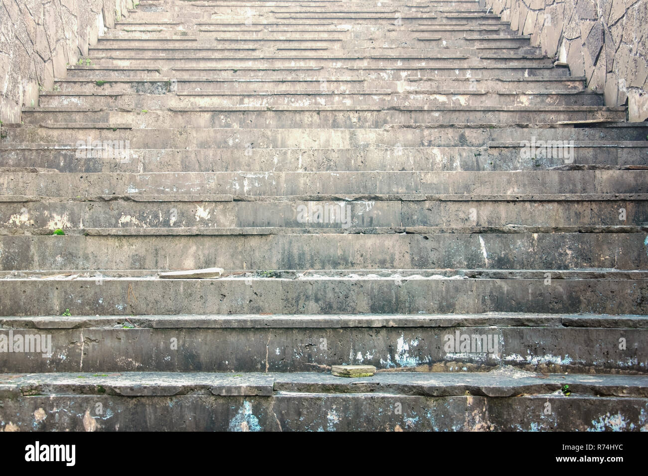 Ragged old stone ladder the texture of a stone conducting up Stock ...