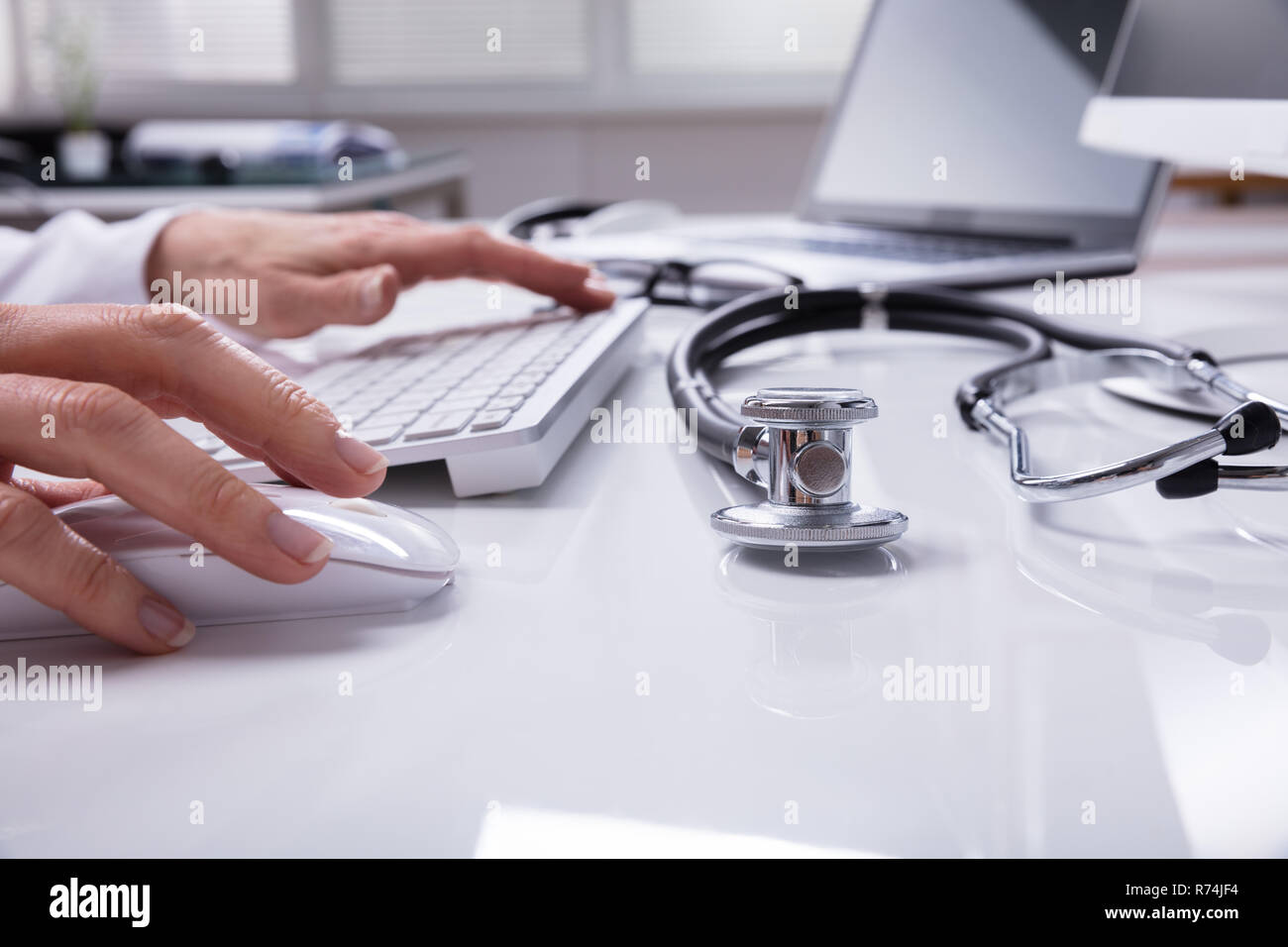 Doctor's Hand Using Computer Keyboard Stock Photo - Alamy