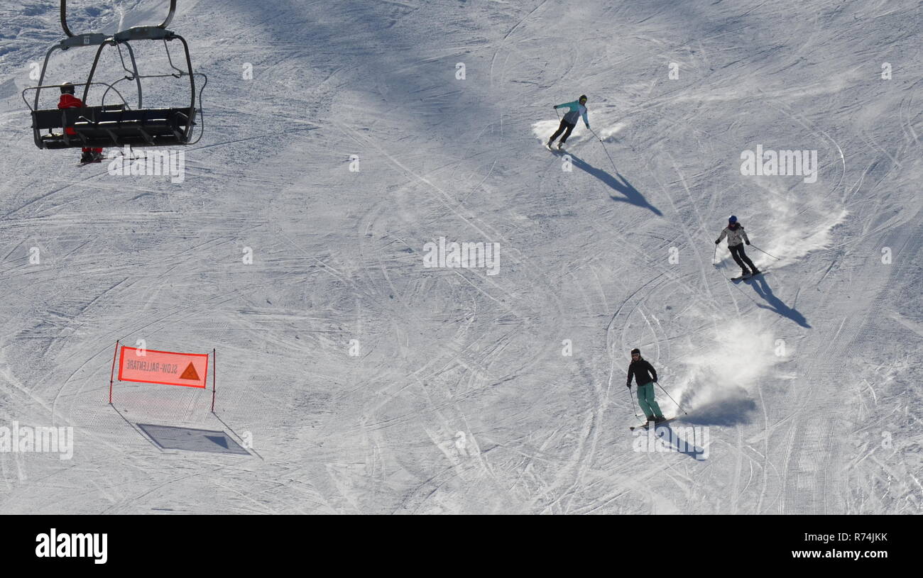 Up and down on the sunny ski piste Stock Photo - Alamy