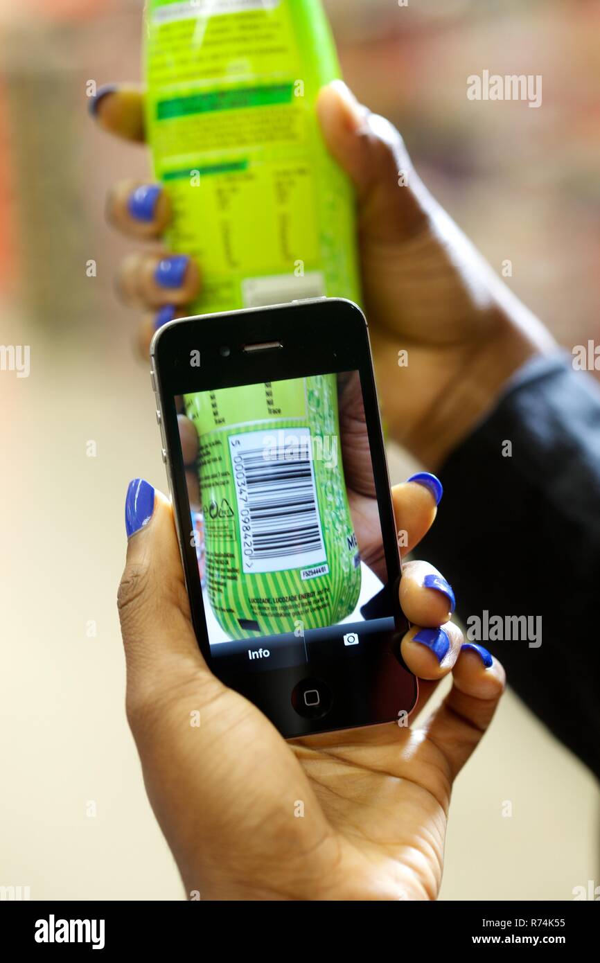 Shopping using a smart phone to scan barcodes of consumer goods in a ...