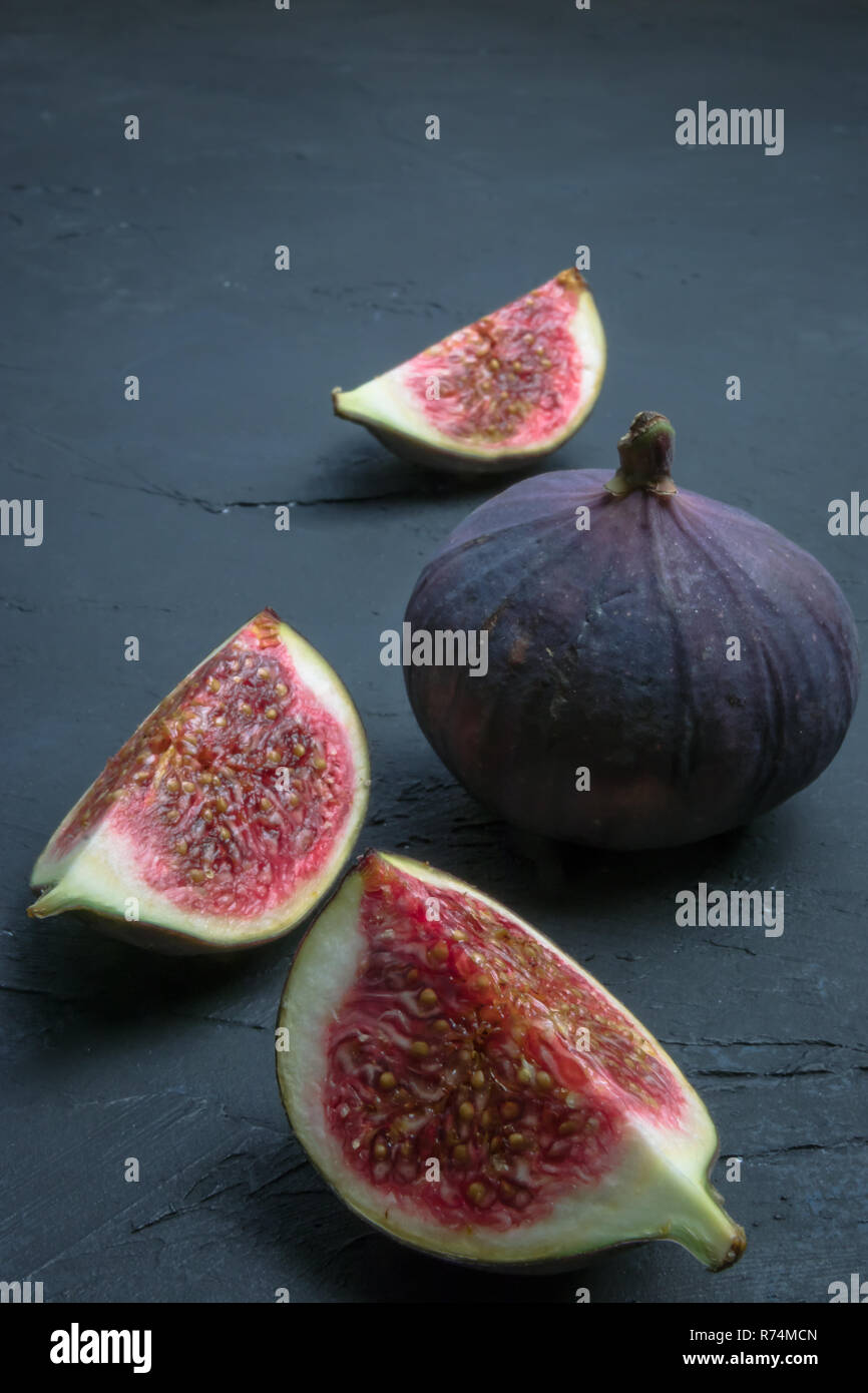Fresh figs. Food photography. Creative scheme of whole and sliced figs ...