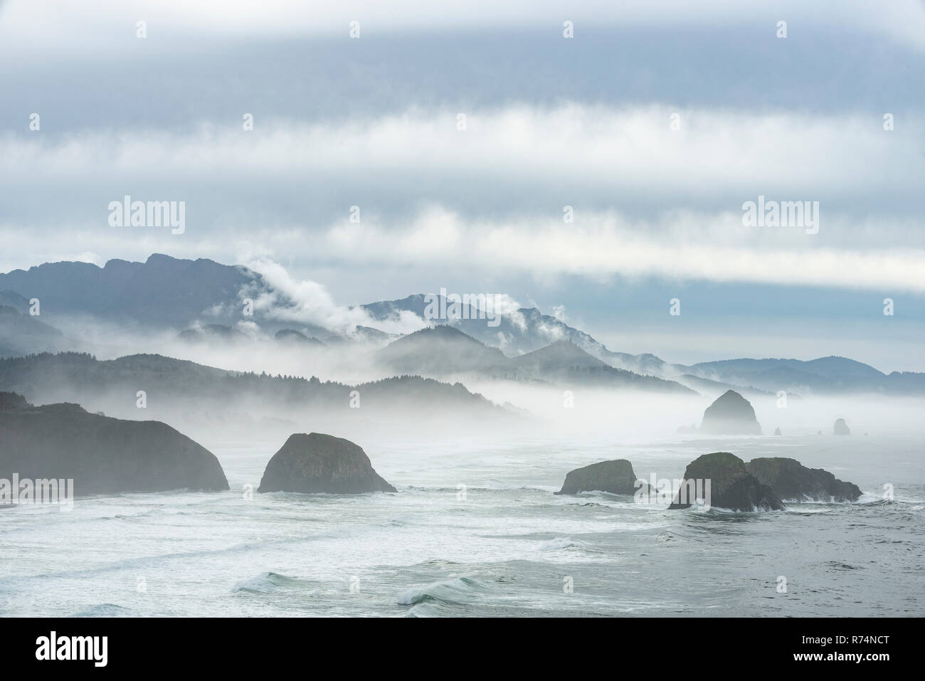 Heavy fog, Ecola State Park, as seen from Cannon Beach, Oregon, USA, by ...