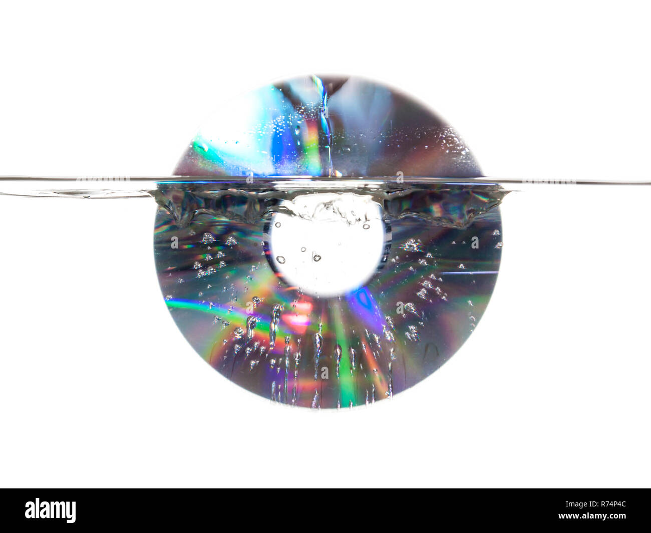 Compact disk sinking in water Stock Photo - Alamy