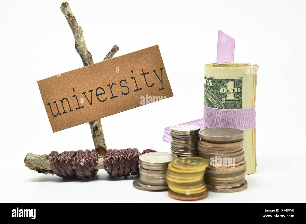 Coins and money with university label Stock Photo - Alamy