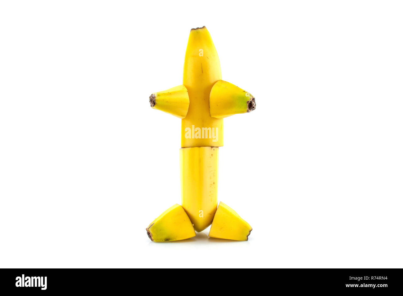 Banana sculpture standing on a white background Stock Photo - Alamy