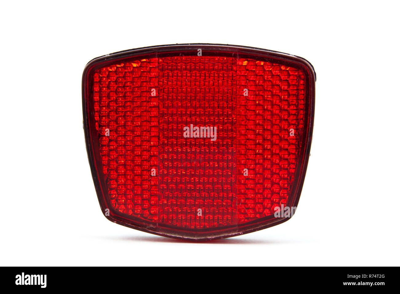 Red reflector on a white background Stock Photo - Alamy