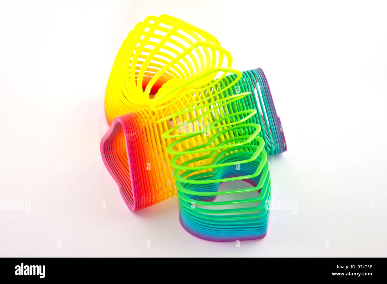 Two slinkys hi-res stock photography and images - Alamy