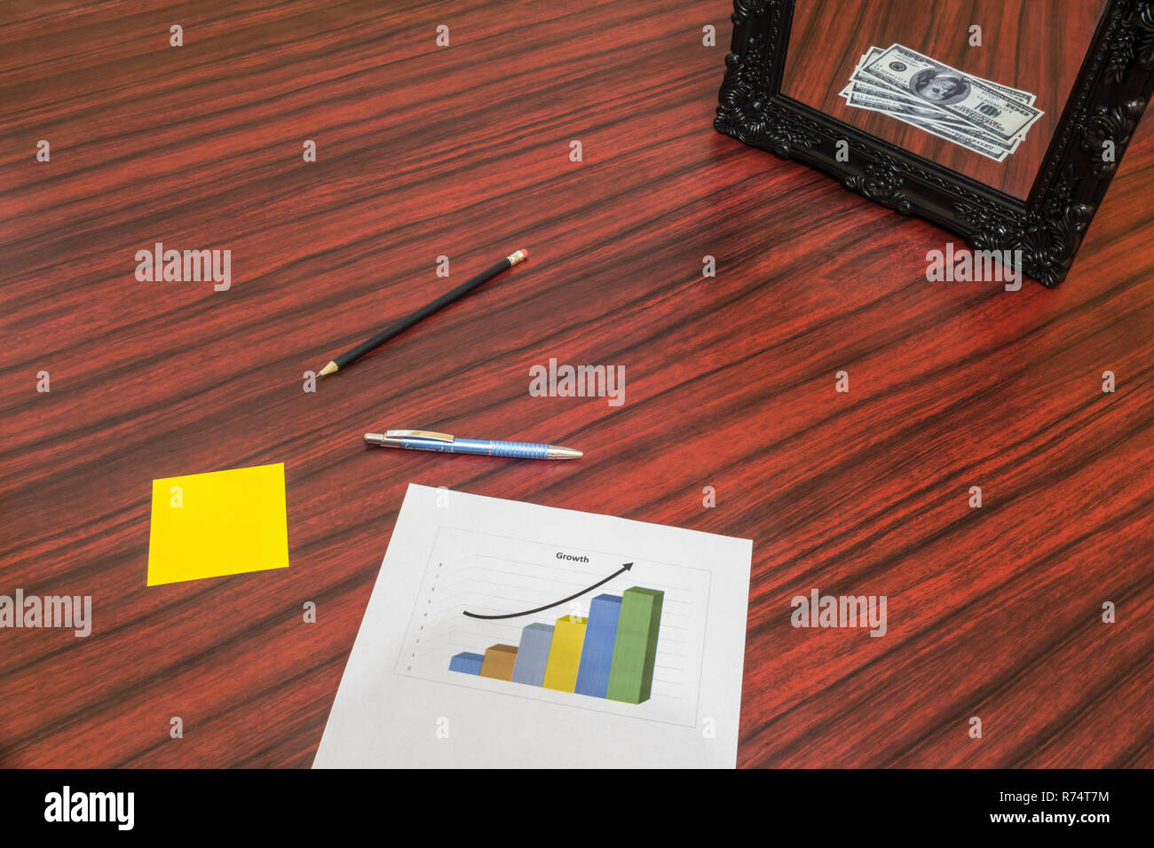 Reflection of money in the mirror. Both objects are surrounded by a ...