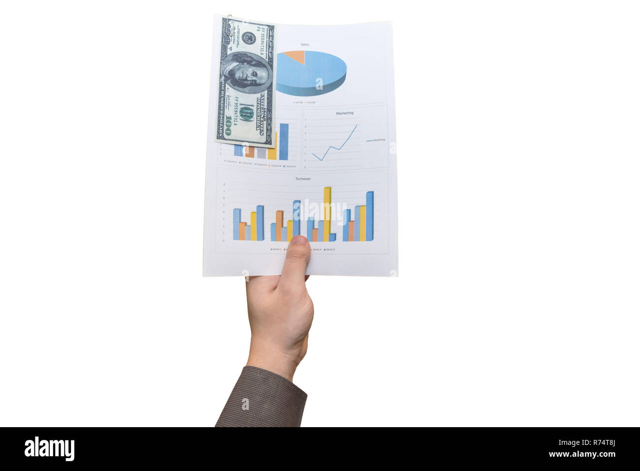 Human hand holding a sheet of paper with graphs on it and a 100 dollar ...