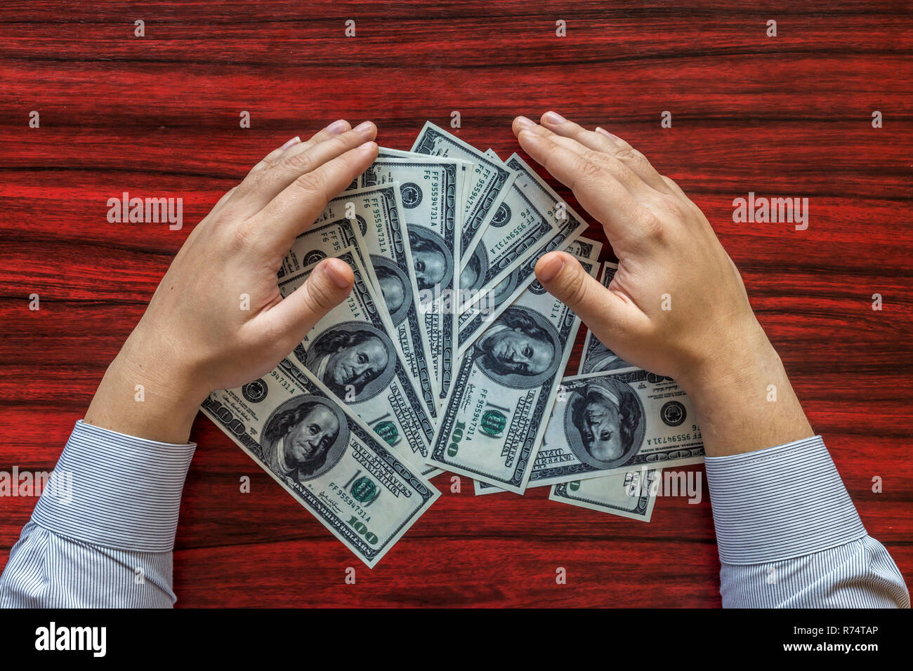 Grabbing money hi-res stock photography and images - Alamy