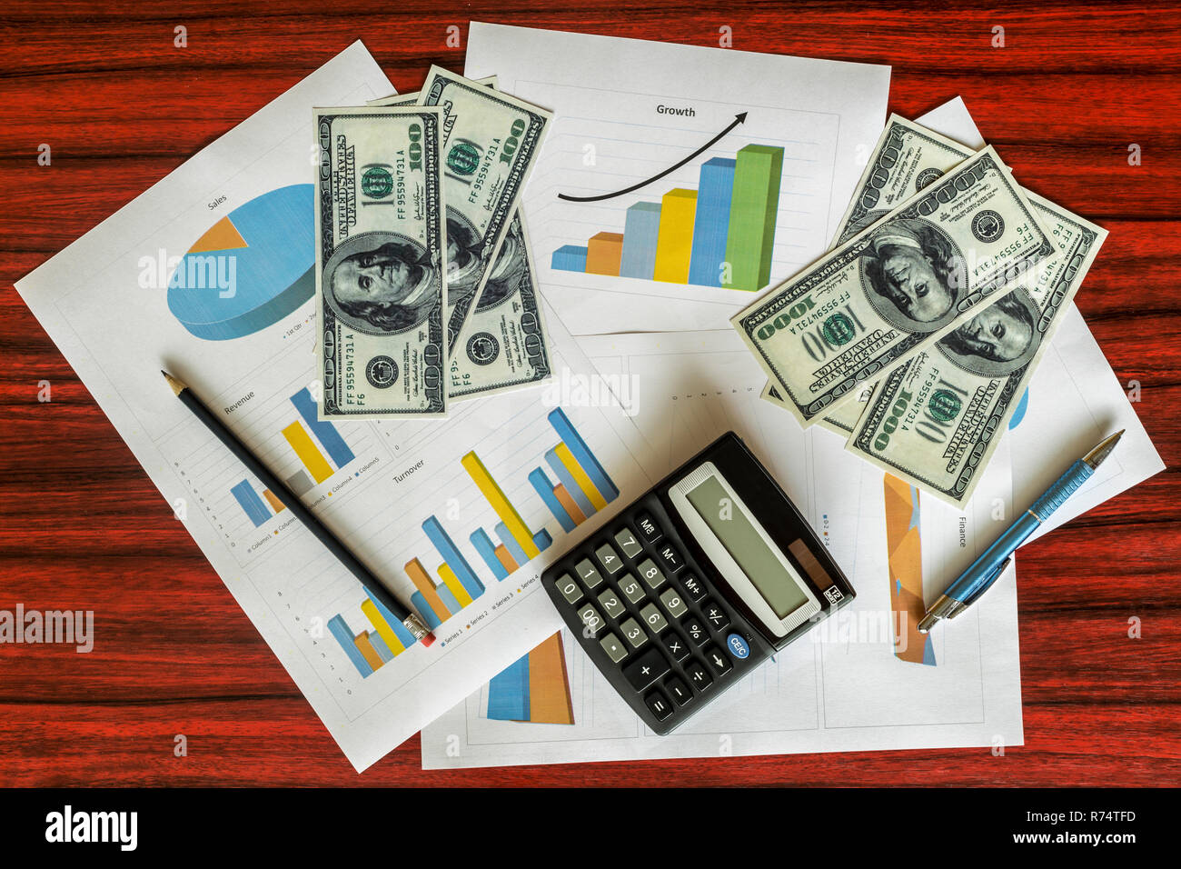 Bunch of printed charts and graphs with dollar bills on them Stock ...