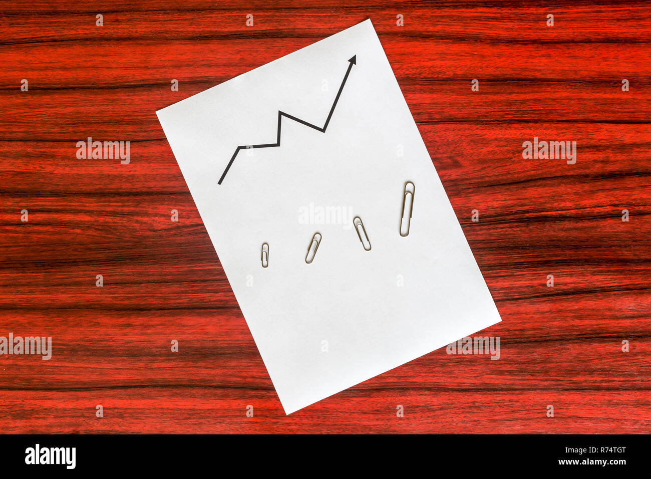 Sheet of paper with printed curve graph Stock Photo - Alamy