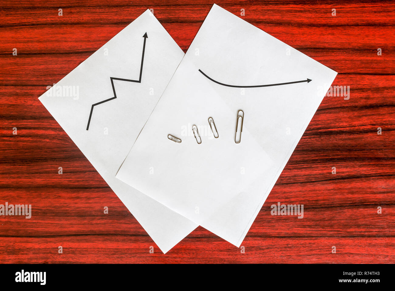 Sheet of paper with printed curve graph Stock Photo - Alamy