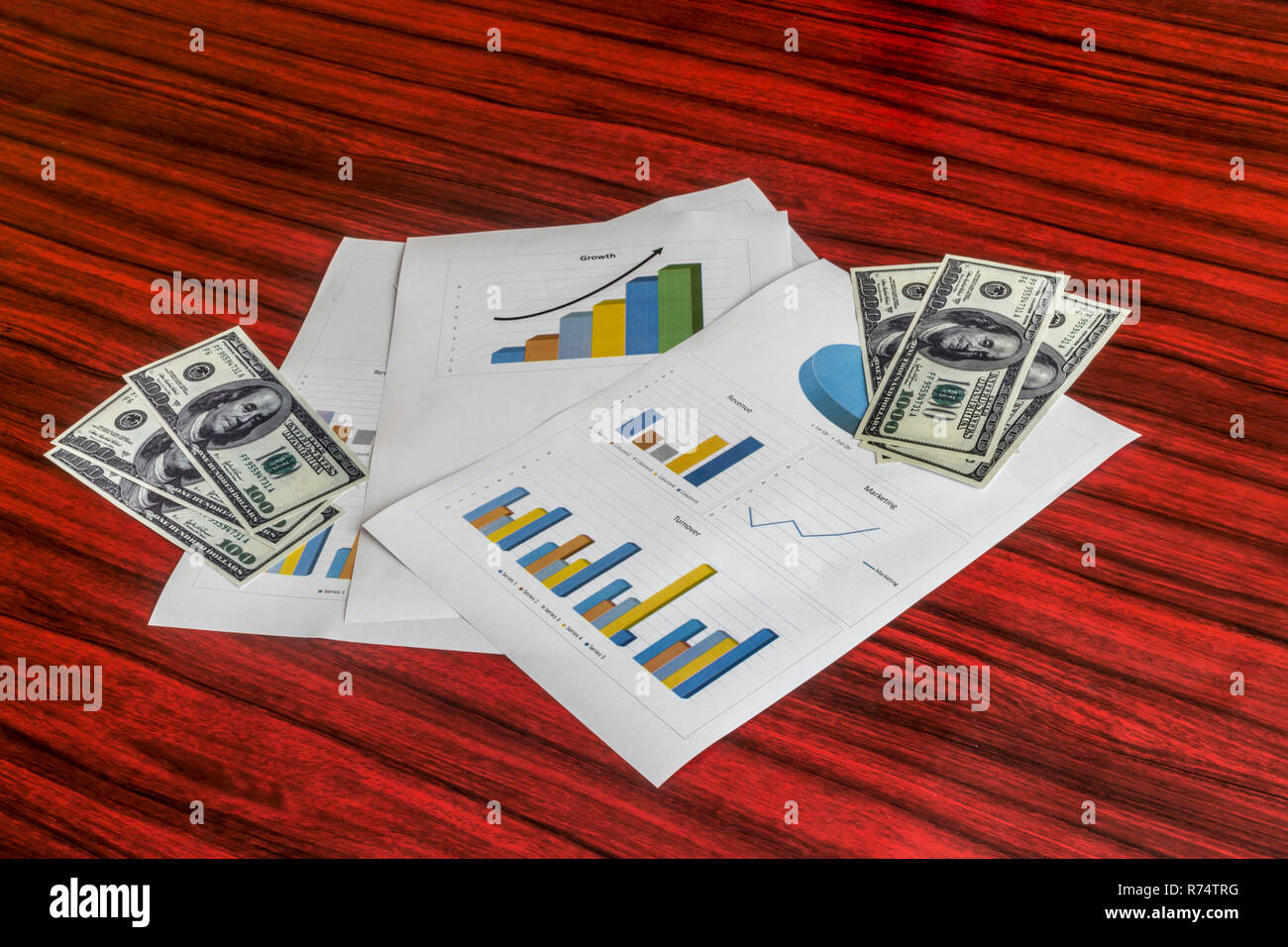 Bunch of printed charts and graphs with dollar bills on them Stock ...