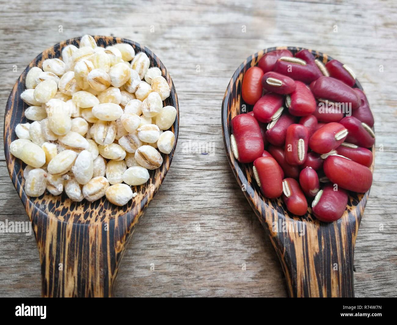 seed on wood spoon / grains or cereals seeds on wooden spoon various ...