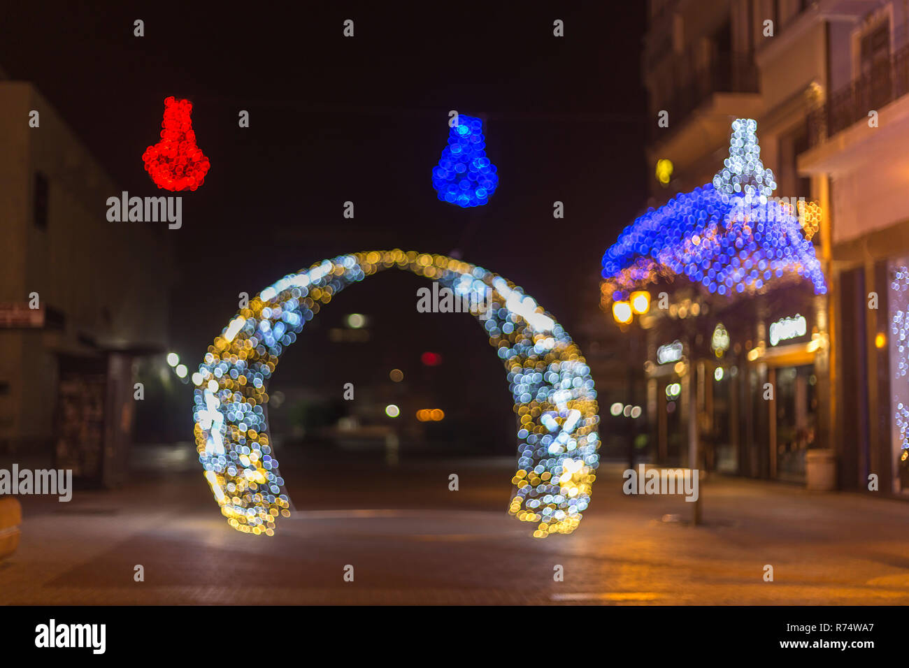 Christmas lights shaped as beautiful arch Stock Photo - Alamy