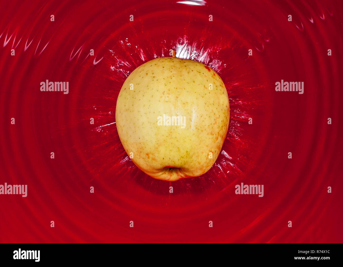 Yellow apple falling water hi-res stock photography and images - Alamy