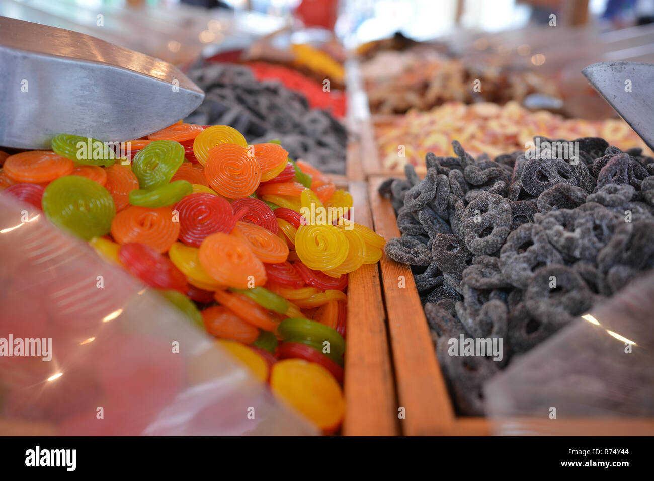 colorful loose candies for sale at a market Stock Photo - Alamy