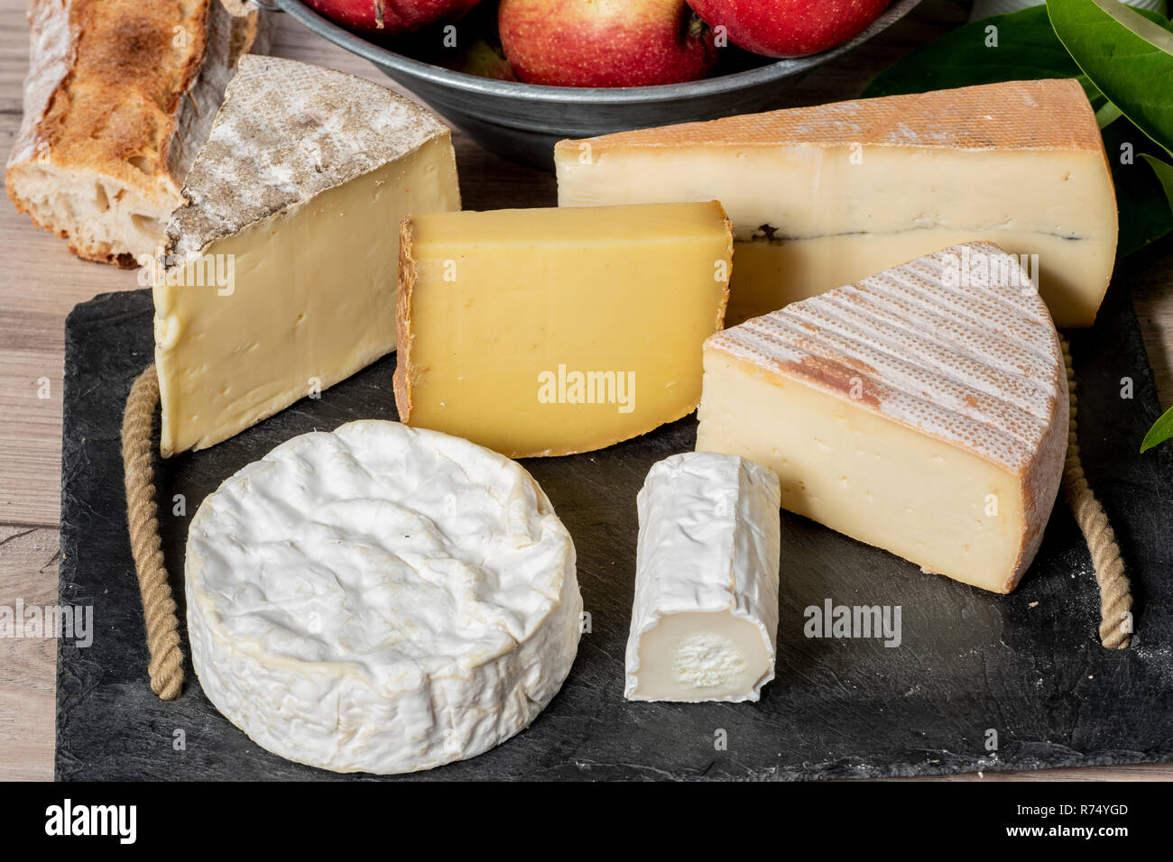 Camembert of Normandy with different french cheeses Stock Photo - Alamy