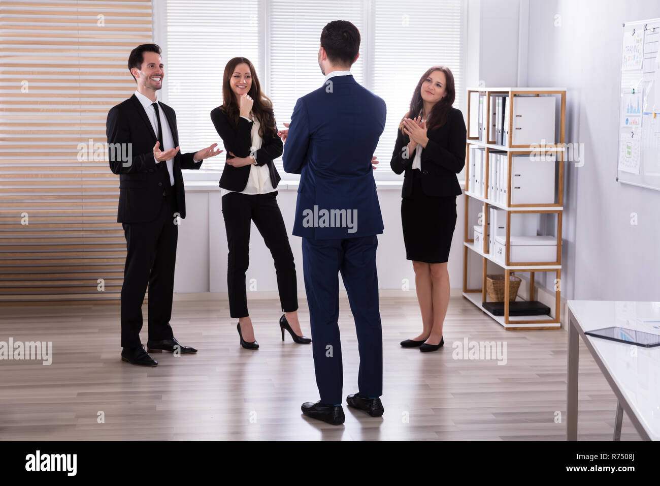 Manager With His Colleague Having Discussion Stock Photo - Alamy